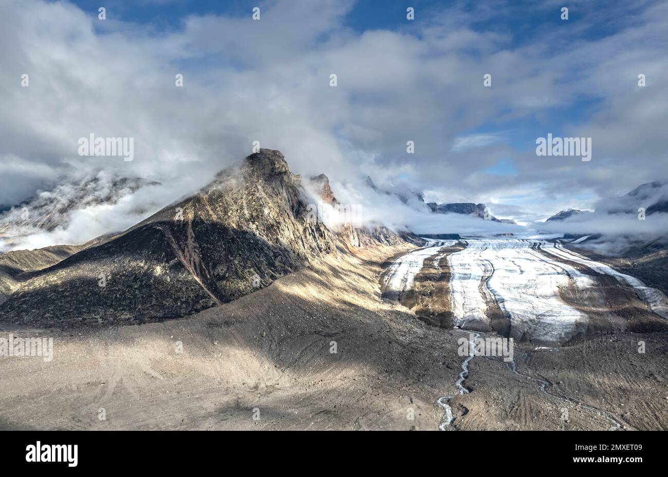 The tongue of Tupermit Glacier in Akshayuk Pass. Auyuittuq National ...