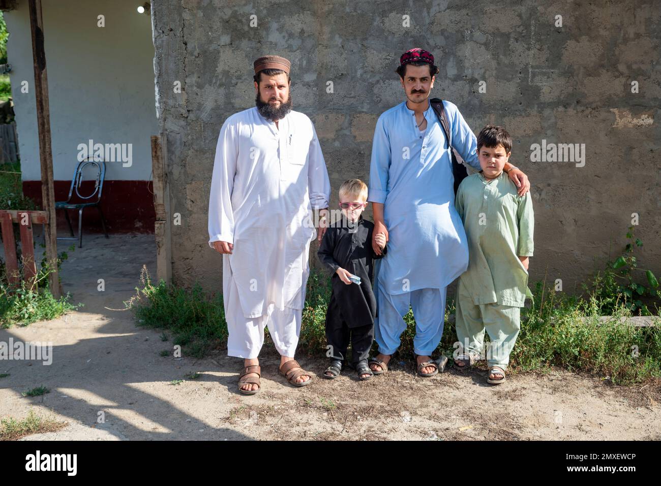Photo of a Kohistani family with an albino young boy, Boyun village ...