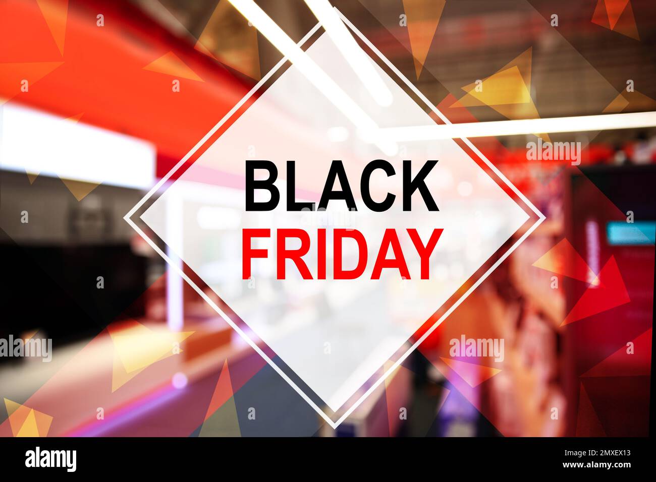 Blurred view of modern shopping mall interior. Black Friday Sale Stock ...