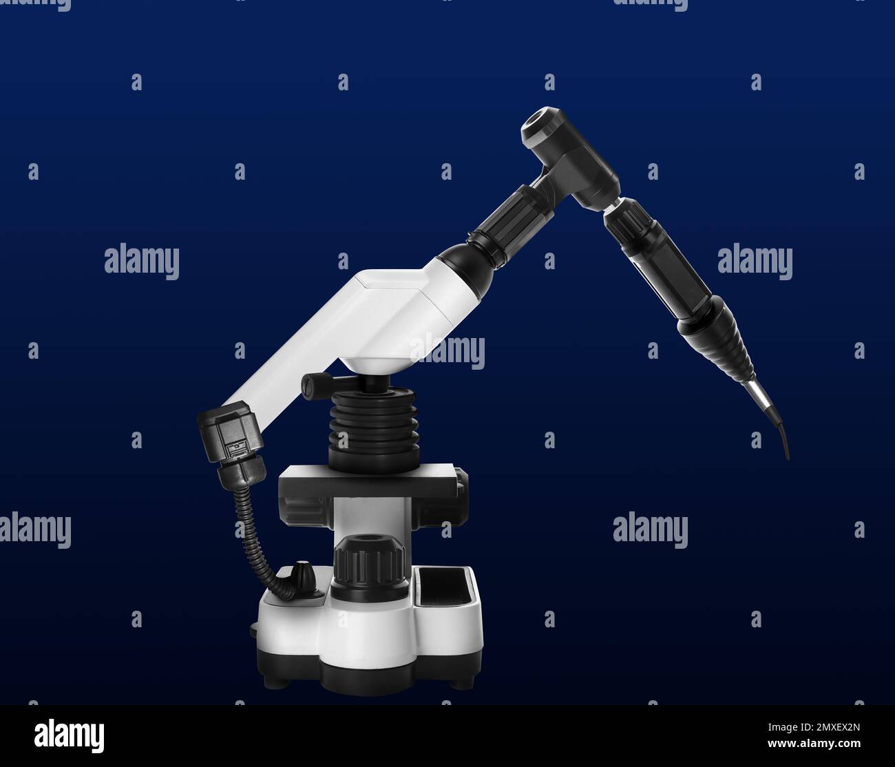 Modern electronic laboratory robot manipulator on blue background ...