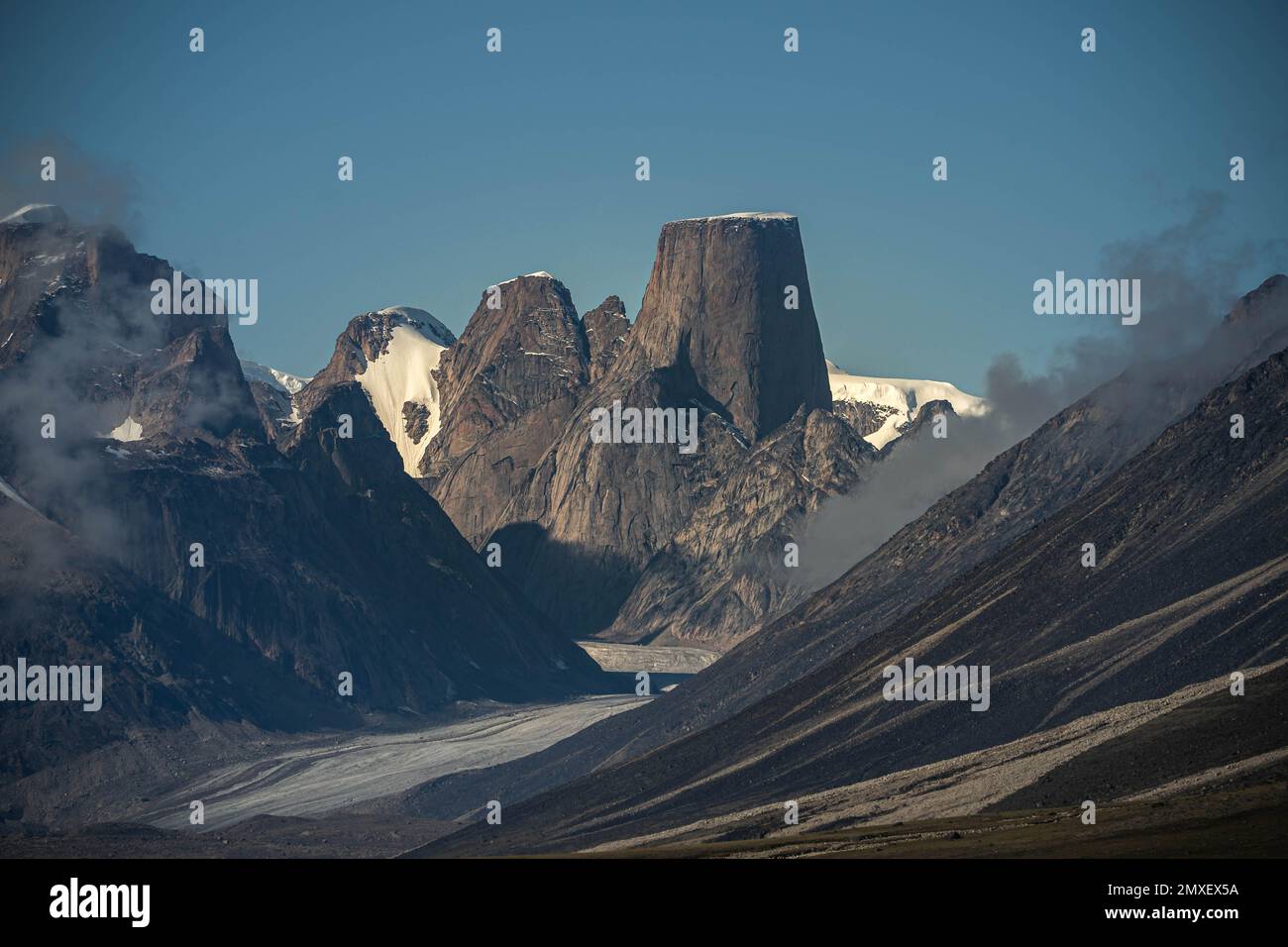 Iconic granite rock of Mt.Asgard towers above Turner glacier in remote ...