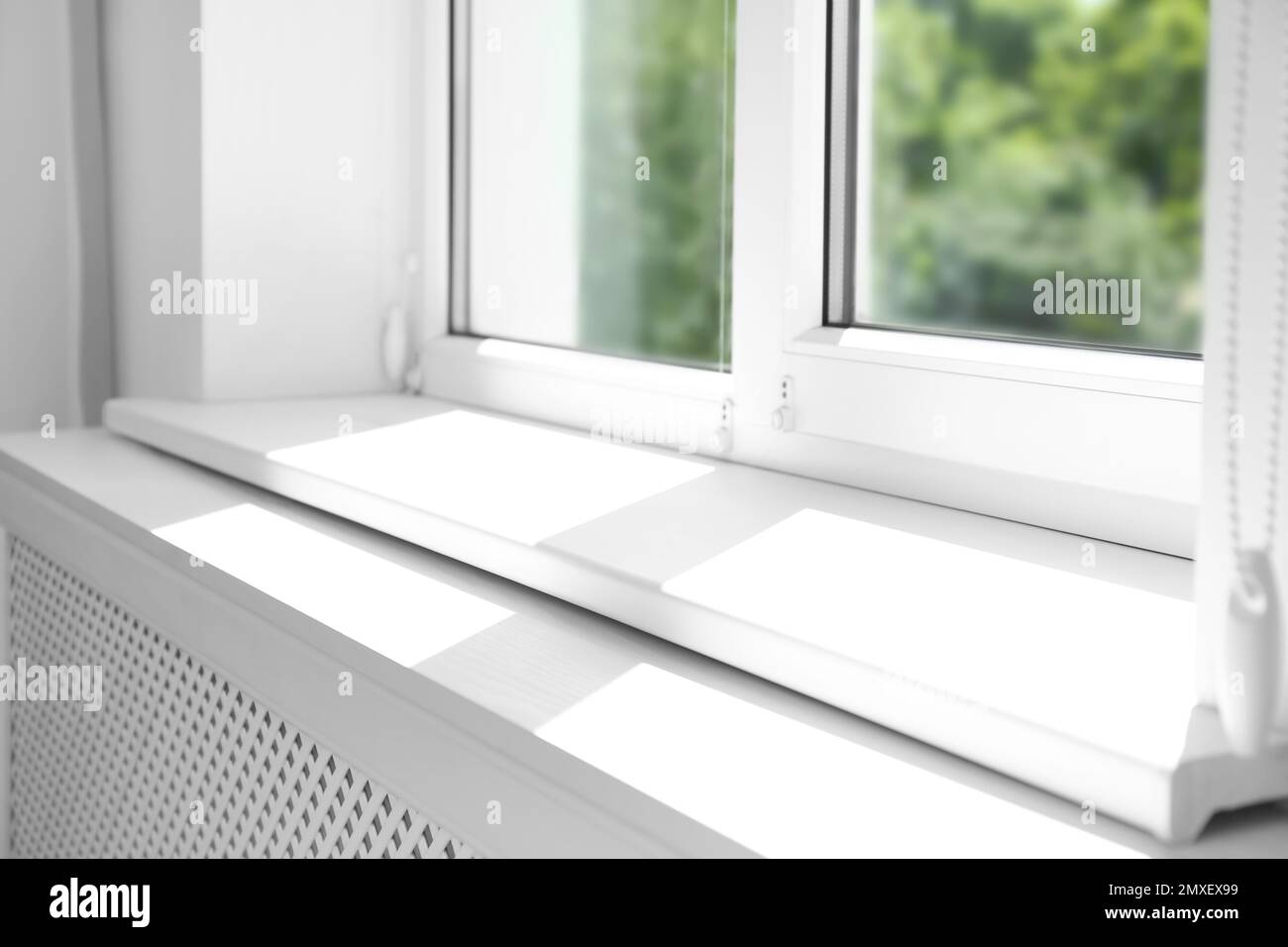 Closeup view of window with empty white sill Stock Photo - Alamy