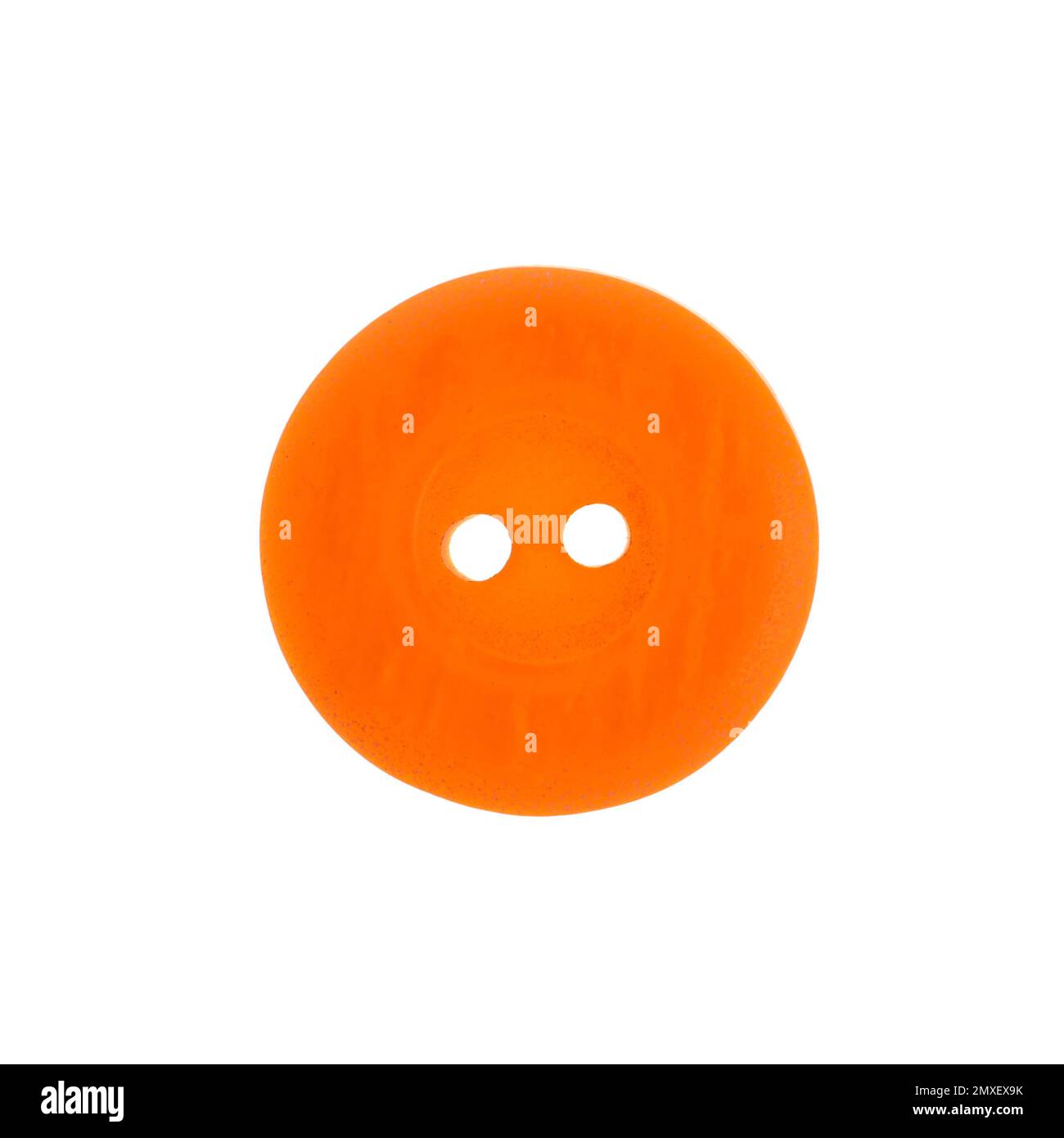 Orange plastic sewing button isolated on white Stock Photo - Alamy
