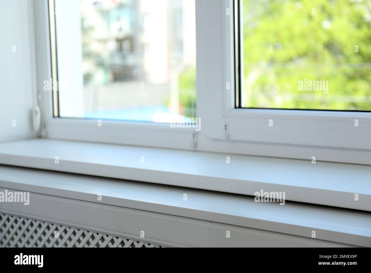 Closeup view of window with empty white sill Stock Photo - Alamy