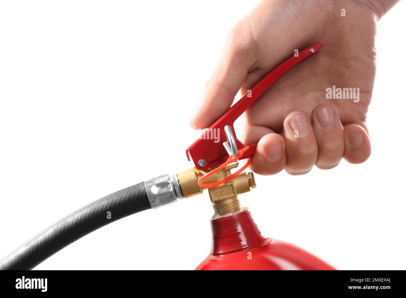 Man using fire extinguisher on white background, closeup Stock Photo ...