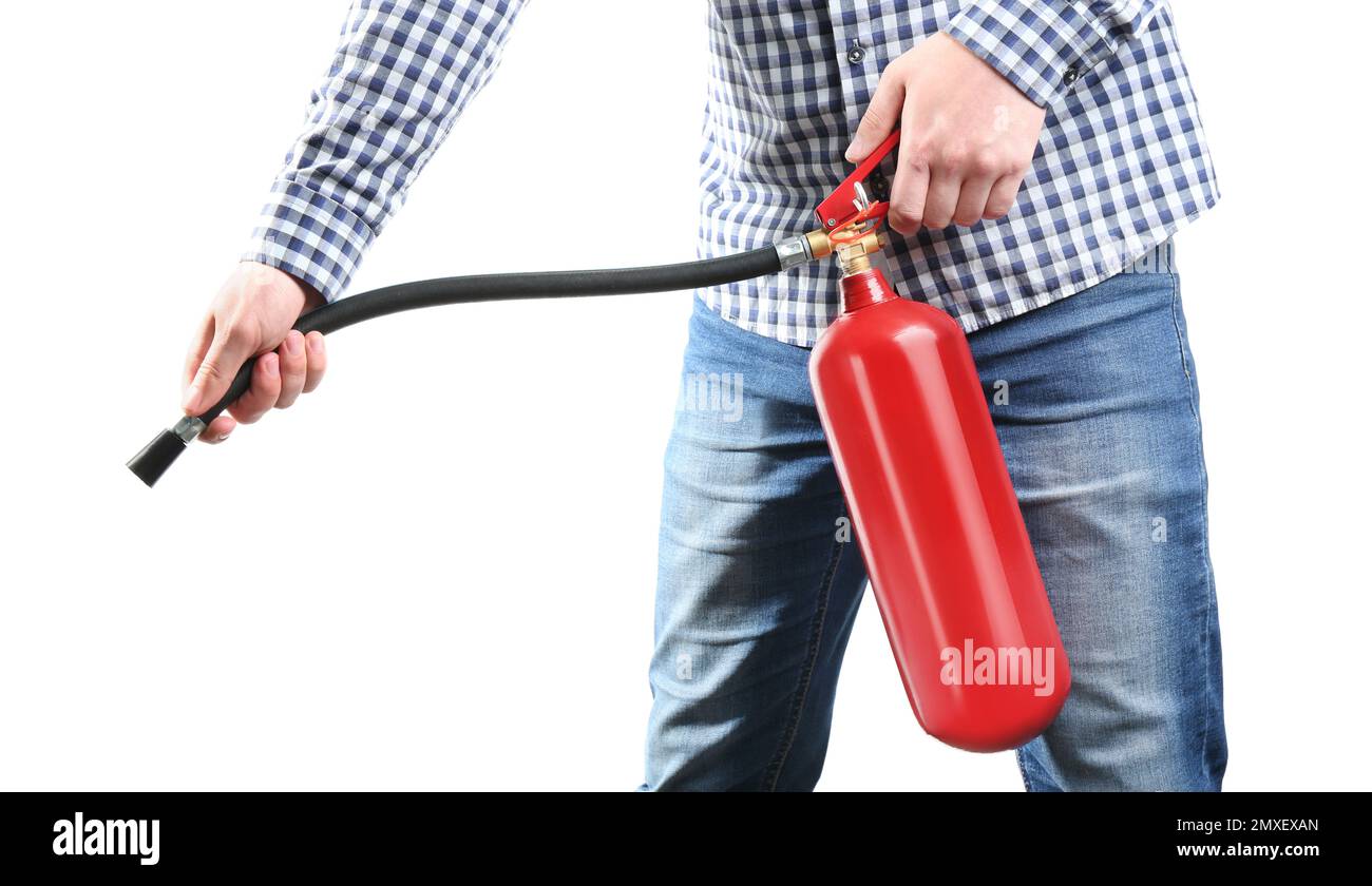 Man using fire extinguisher on white background, closeup Stock Photo ...