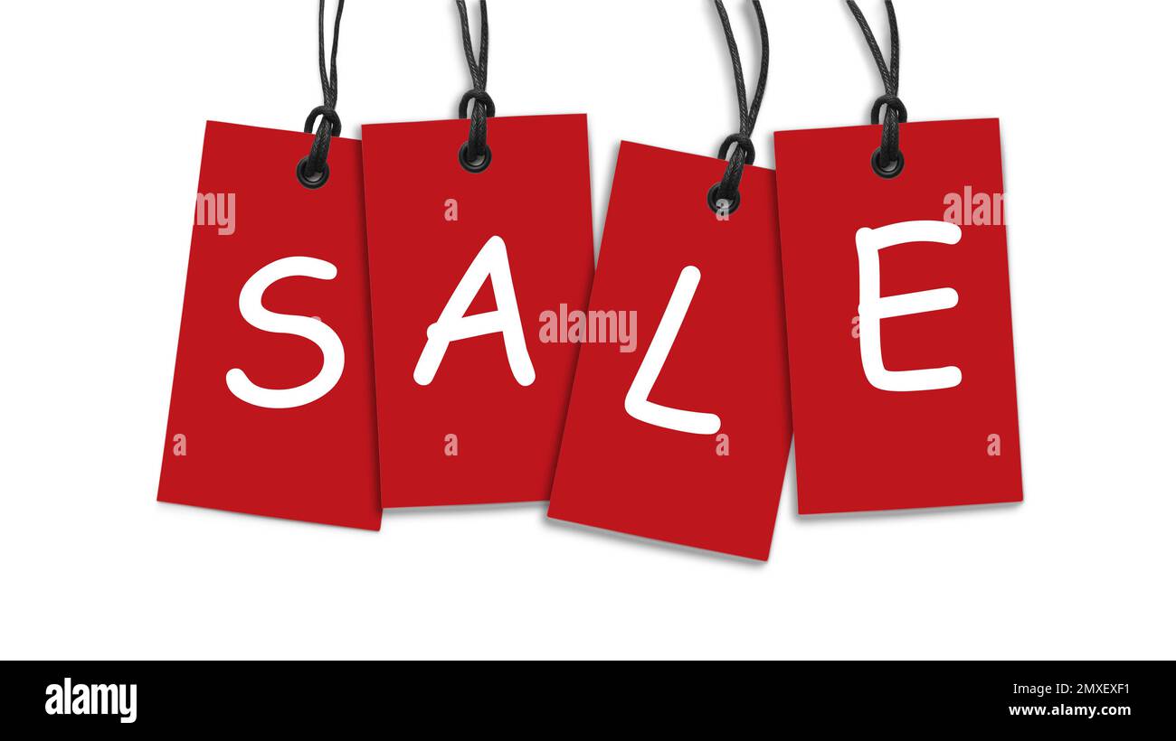 Cardboard tags with word SALE on white background Stock Photo - Alamy