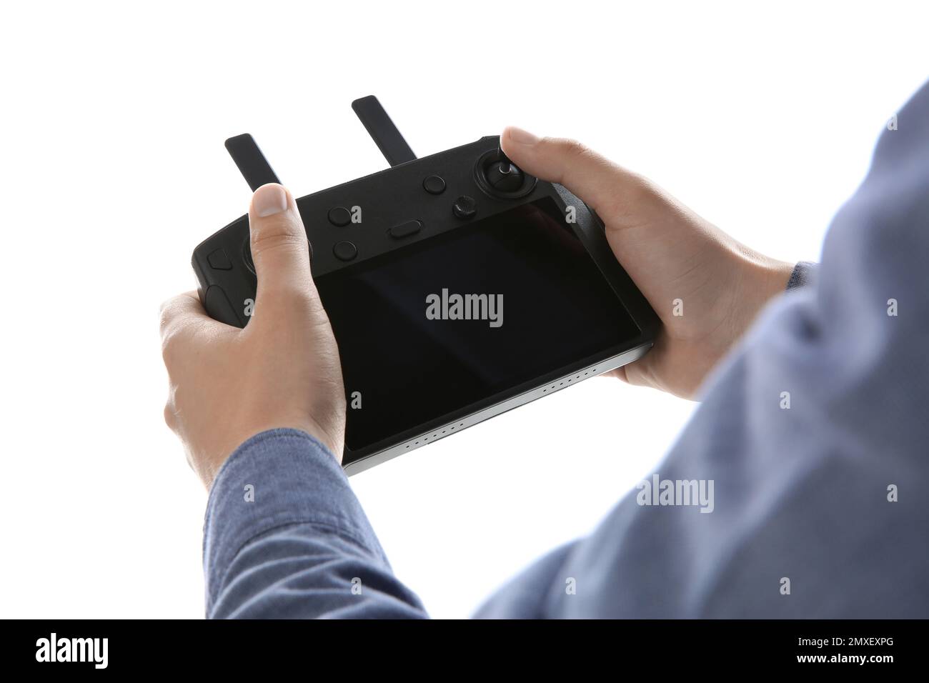 Man holding new modern drone controller on white background, closeup of ...