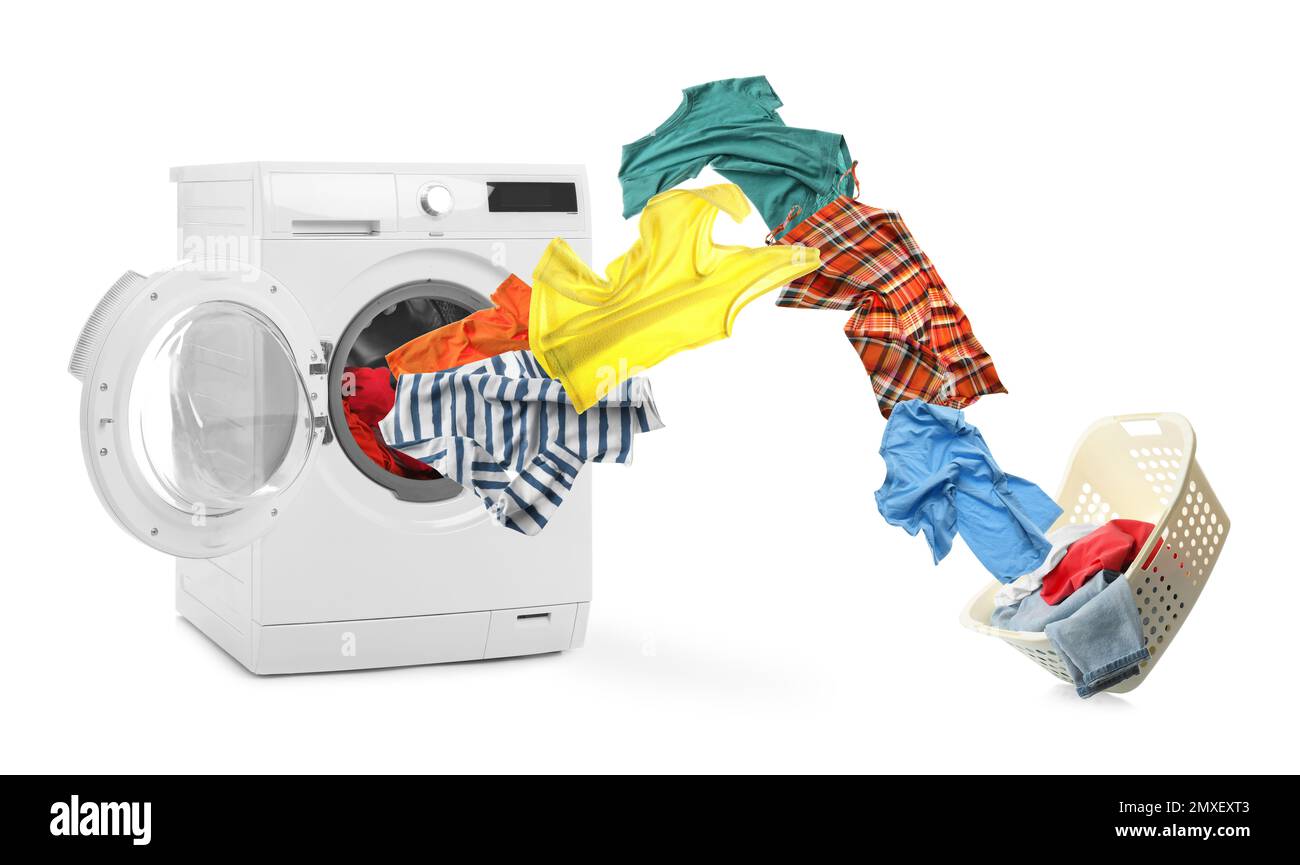 Washing machine and flying clothes on white background Stock Photo - Alamy