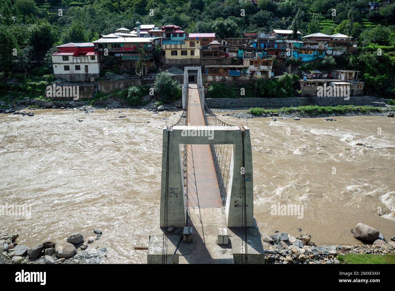 View of Mankar village and its suspension bridge, Swat Valley, Pakistan ...