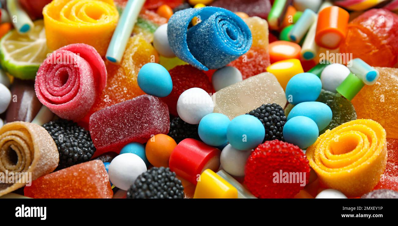 Many different yummy candies as background. Banner design Stock Photo ...