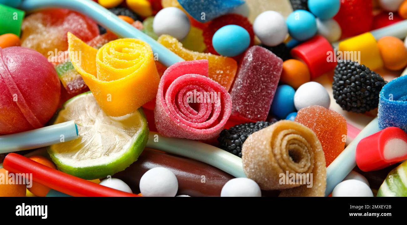 Many different yummy candies as background. Banner design Stock Photo ...