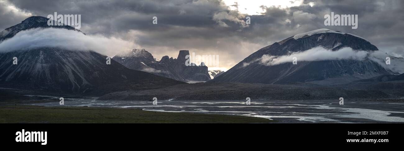 Iconic granite rock of Mt.Asgard towers above Turner glacier in remote ...