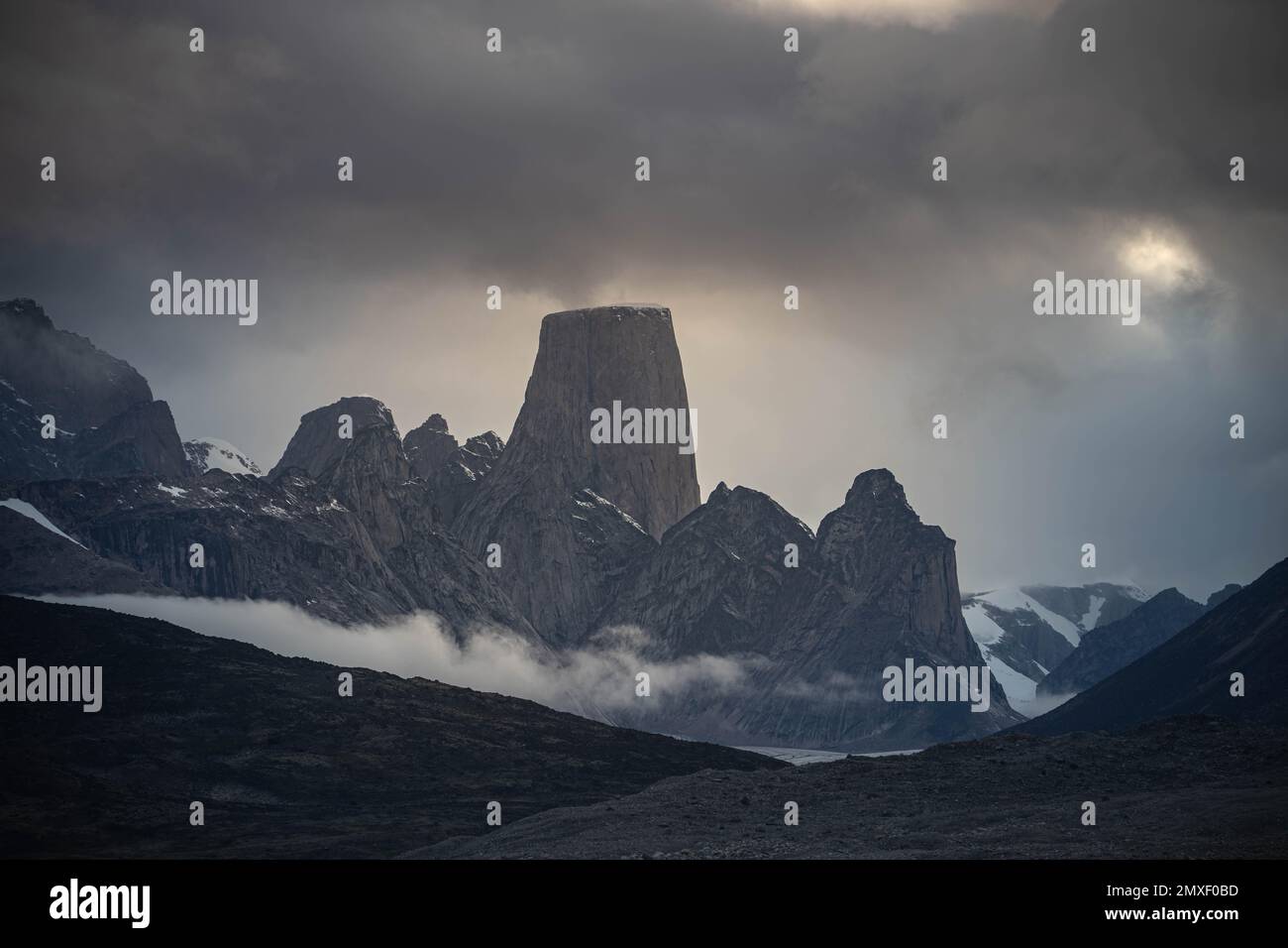 Iconic granite rock of Mt.Asgard towers above Turner glacier in remote ...
