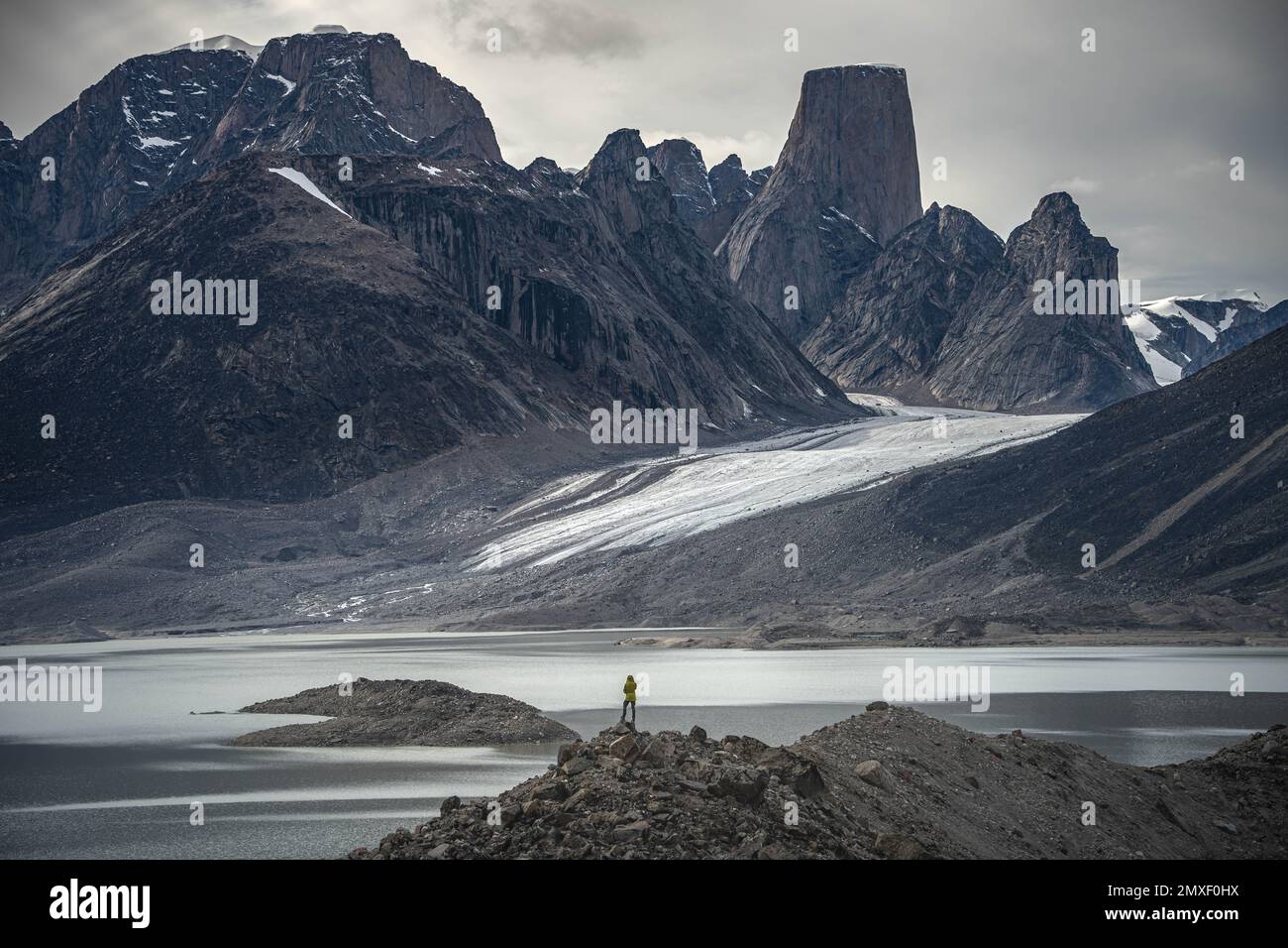 Iconic granite rock of Mt.Asgard towers above Turner glacier in remote ...