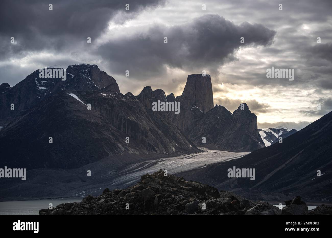 Iconic granite rock of Mt.Asgard towers above Turner glacier in remote ...