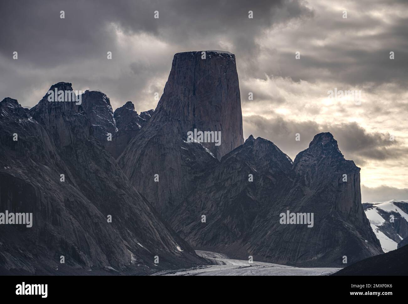 Iconic granite rock of Mt.Asgard towers above Turner glacier in remote ...