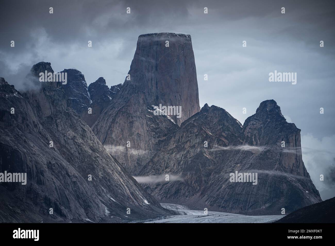 Iconic granite rock of Mt.Asgard towers above Turner glacier in remote ...