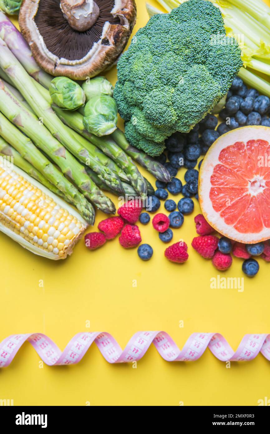 Choice of healthy food for heart, life concept on a color background ...
