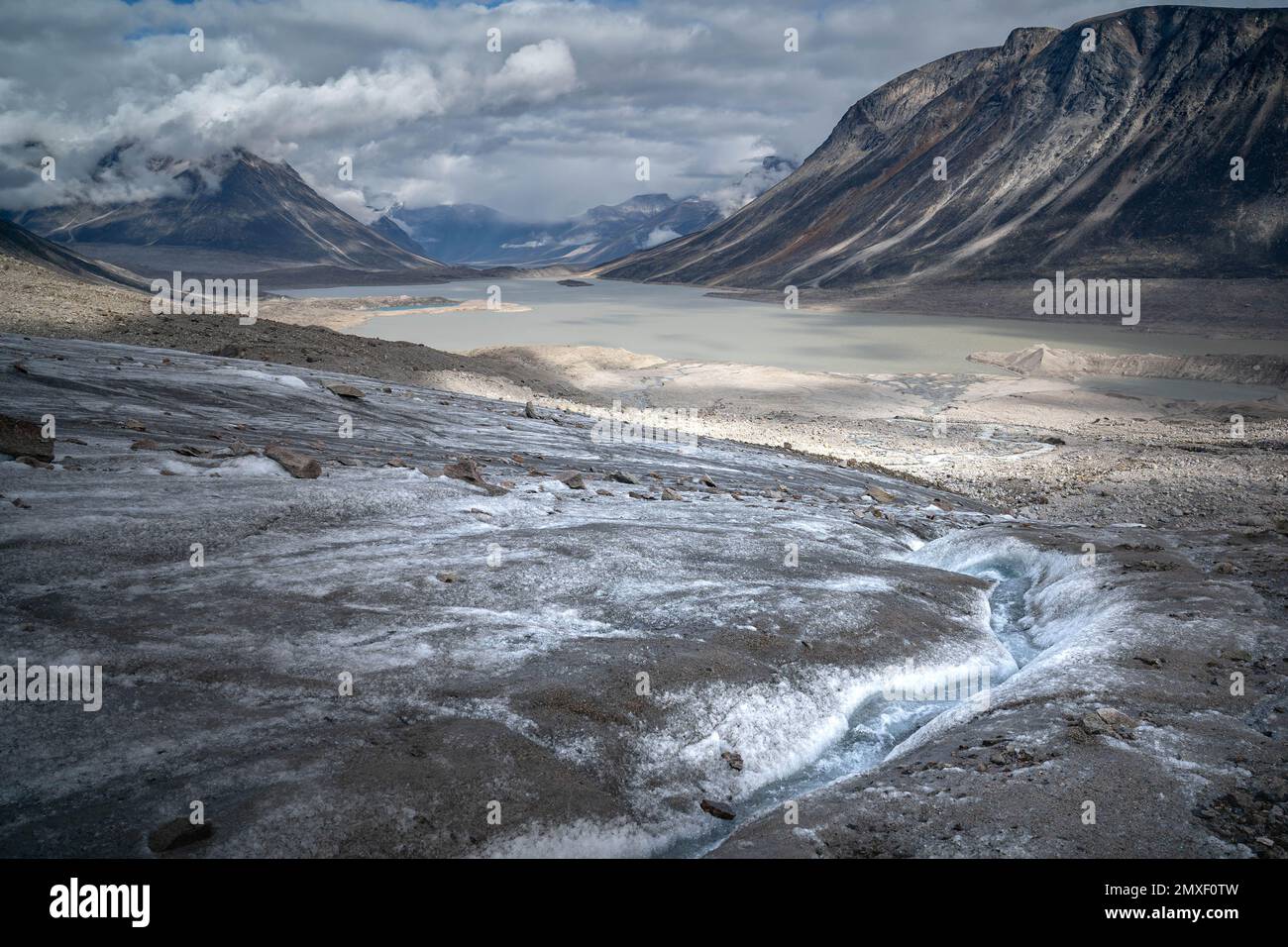 The tongue of Tupermit Glacier in Akshayuk Pass. Auyuittuq National ...
