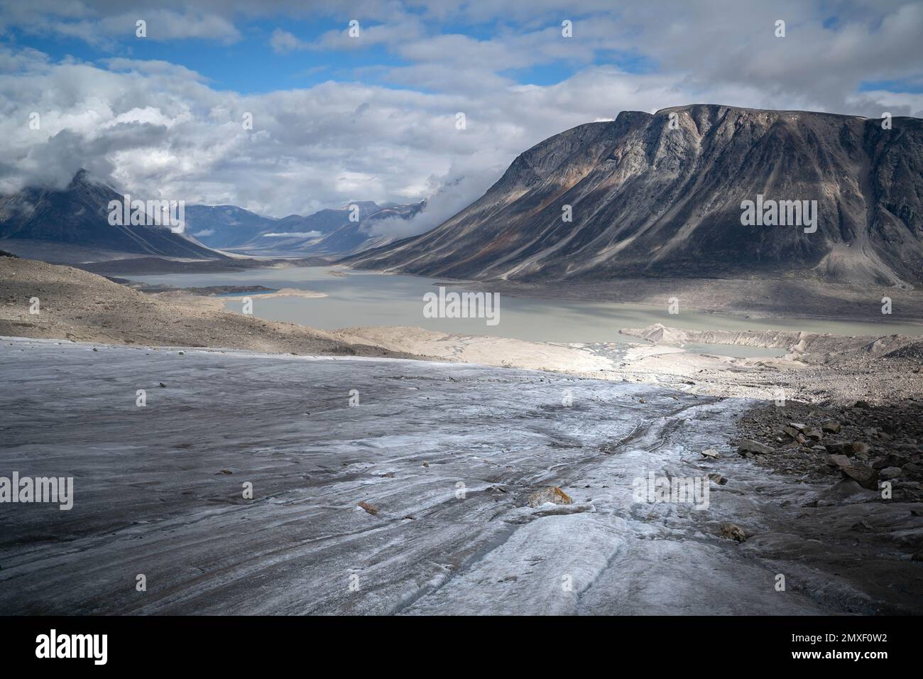 The tongue of Tupermit Glacier in Akshayuk Pass. Auyuittuq National ...