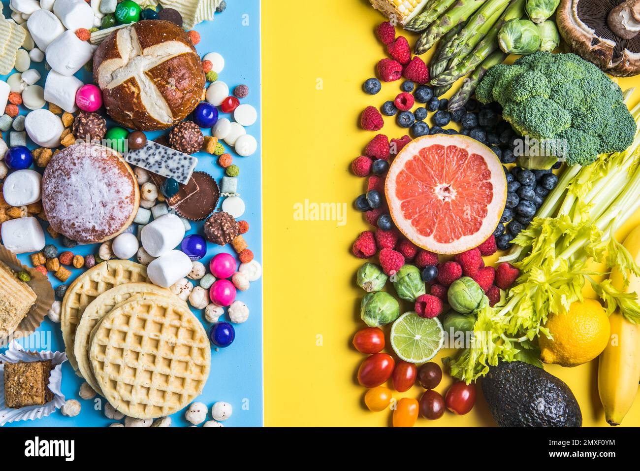 Healthy and unhealthy food concept. Fruit and vegetables vs sweet top ...