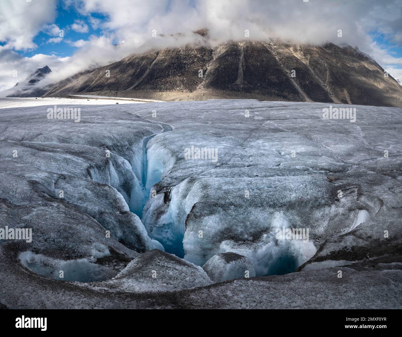 The tongue of Tupermit Glacier in Akshayuk Pass. Auyuittuq National ...