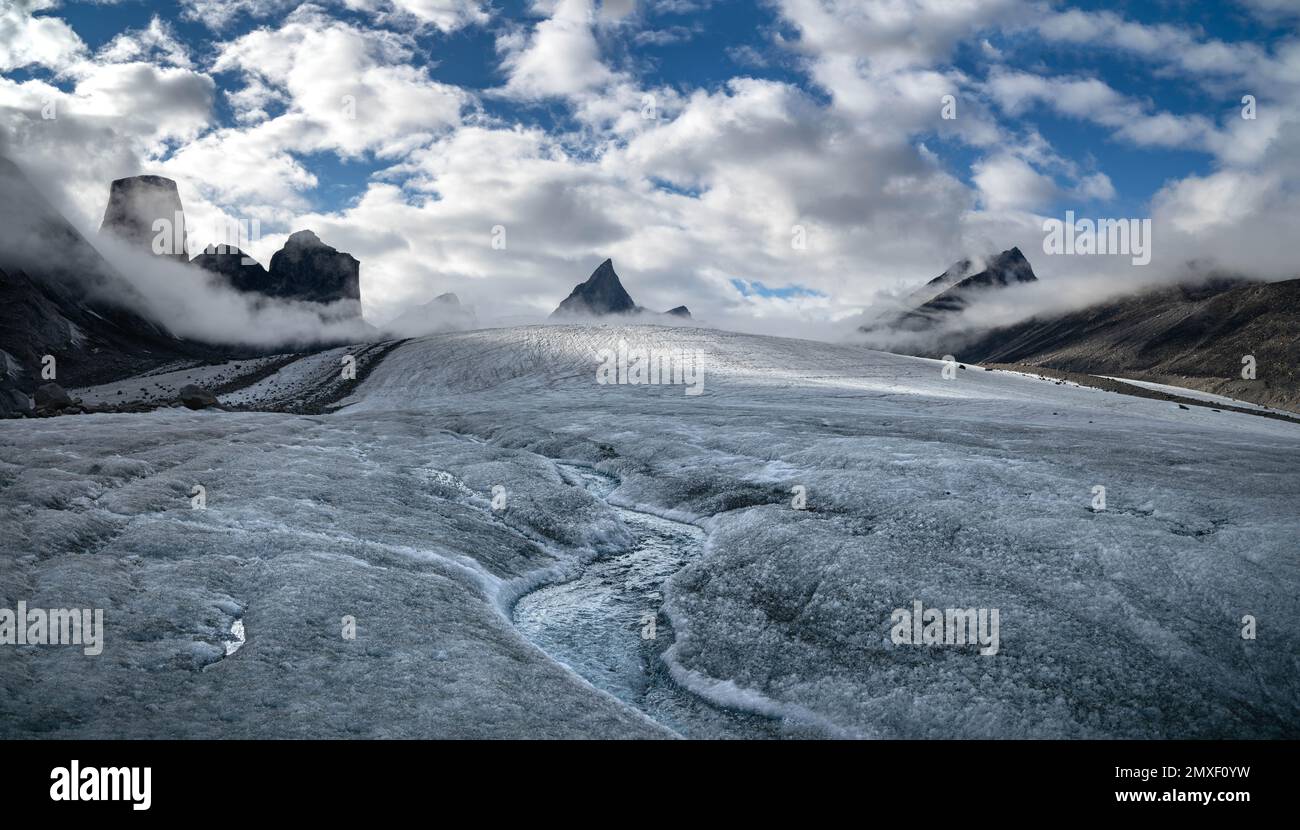 The tongue of Tupermit Glacier in Akshayuk Pass. Auyuittuq National ...