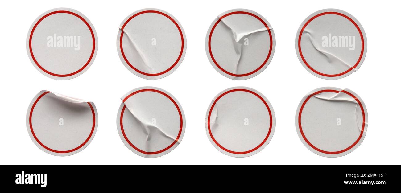 A set of round white and red paper sticker label isolated on white ...