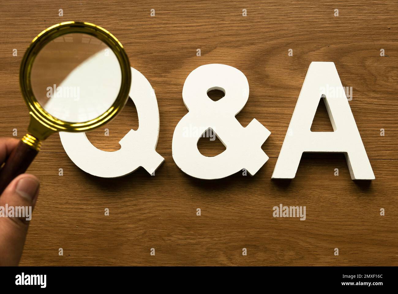 Question and answers concept. Wooden alphabet of letter q and a Stock ...