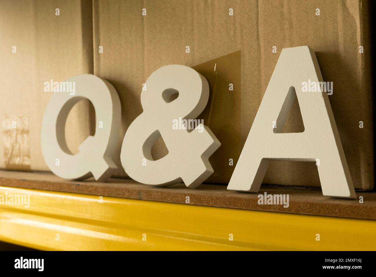 Question and answers concept. Wooden alphabet of letter q and a Stock ...