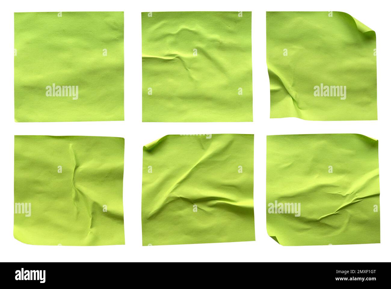 A set of blank fluorescent green rectangular paper glued crumpled and ...