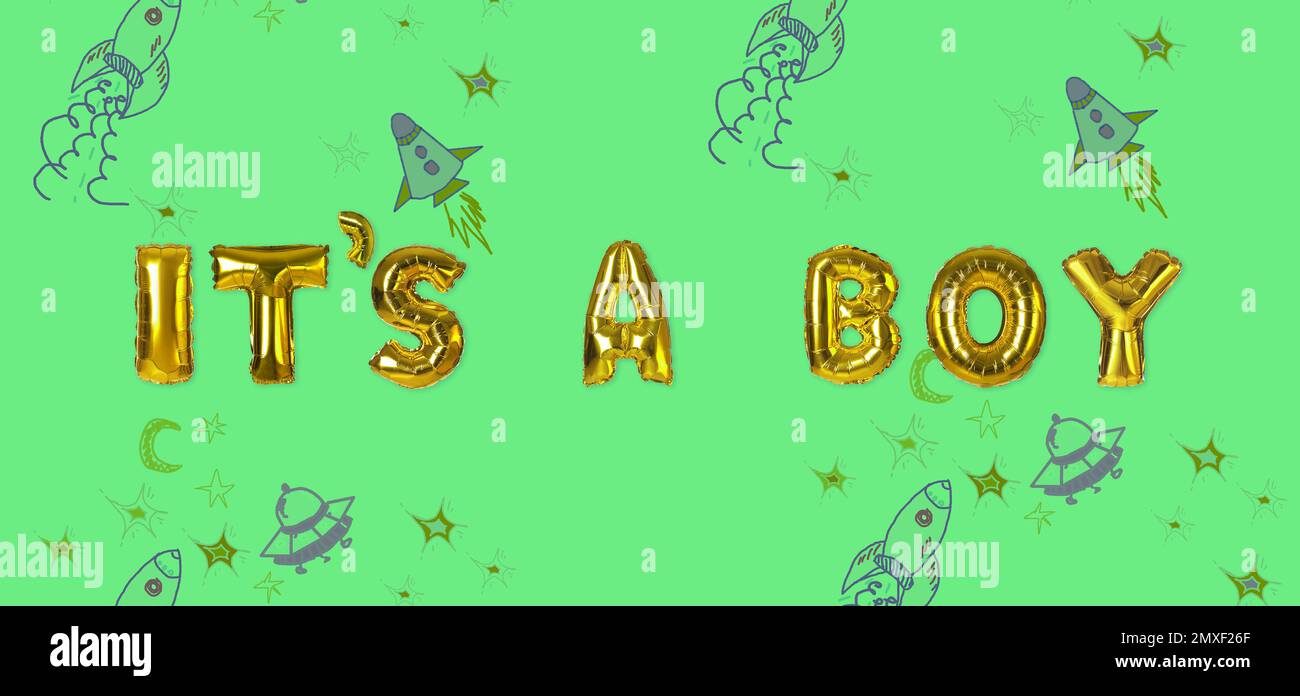 Phrase ITS A BOY made of foil balloon letters on green background ...