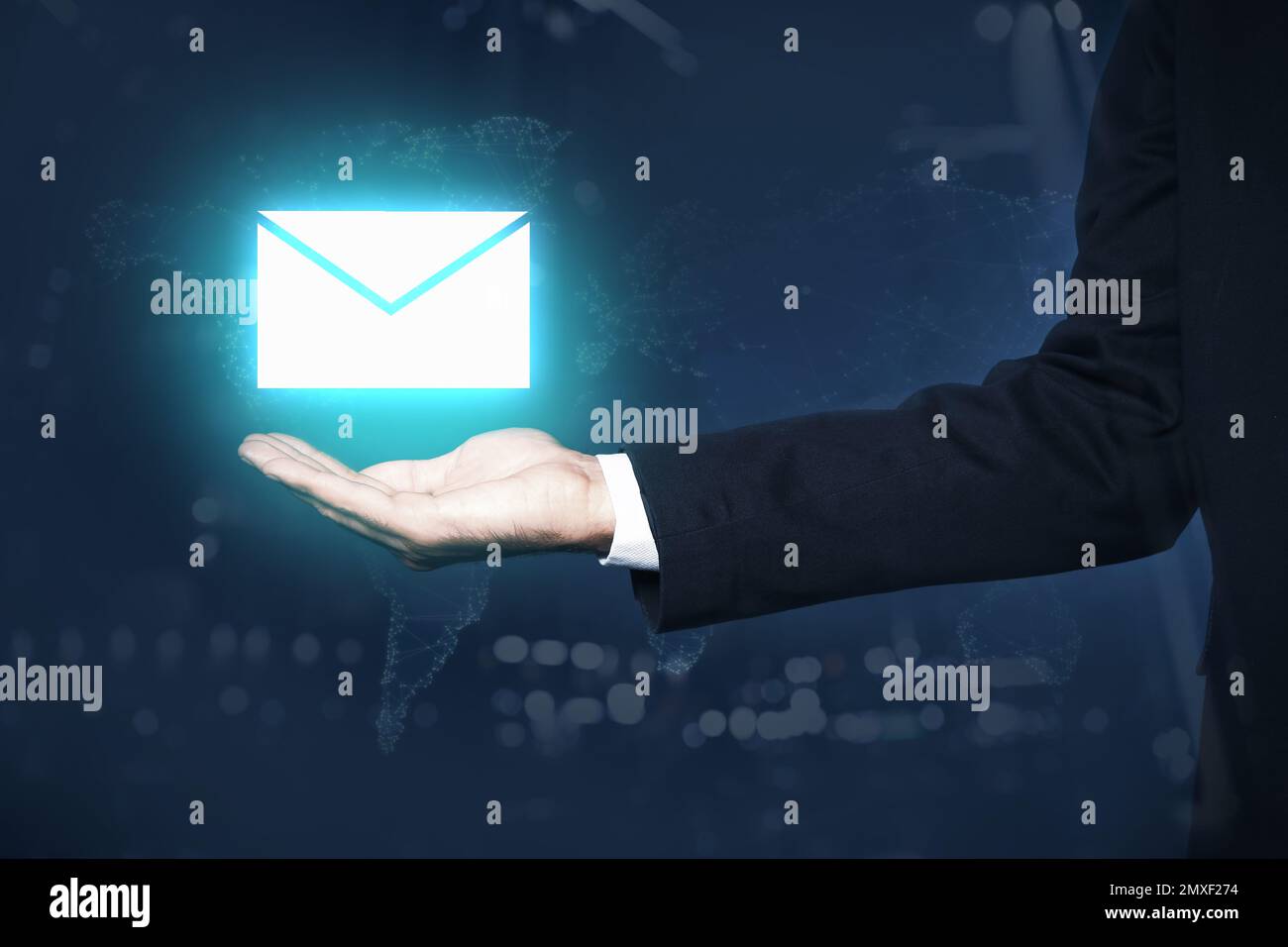 Electronic mail. Businessman demonstrating virtual image of envelope ...