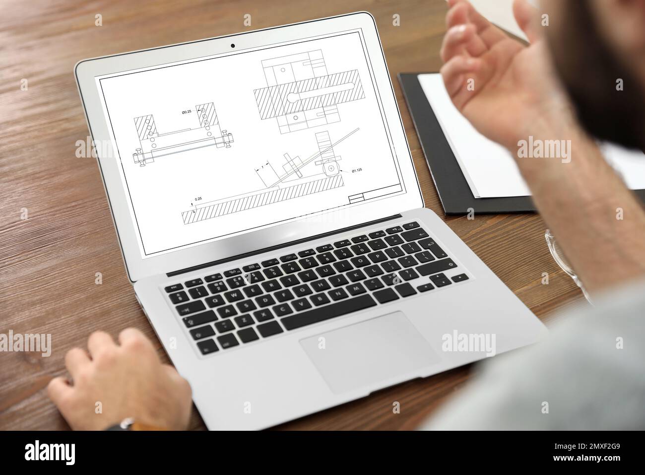 Smart factory engineer using laptop hi-res stock photography and images ...