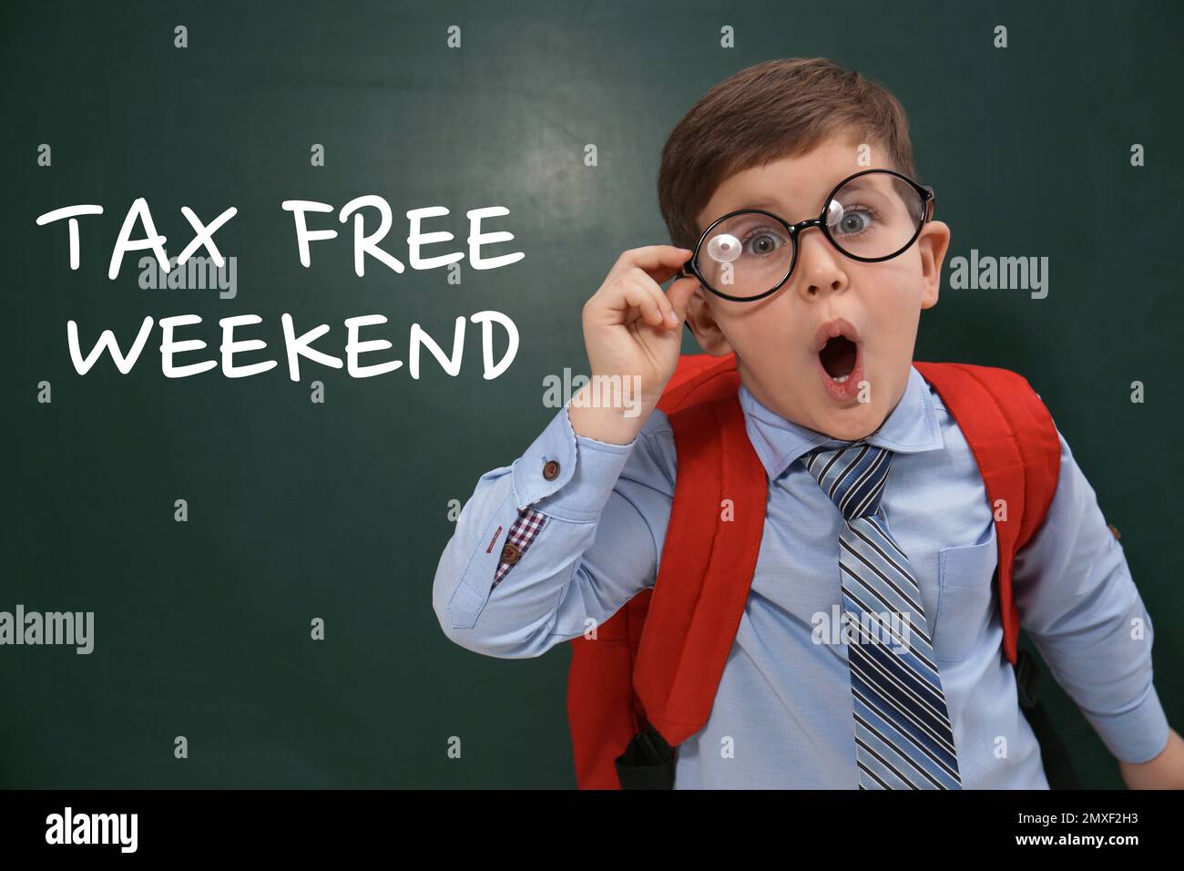 Little boy with backpack and text TAX FREE WEEKEND written on ...