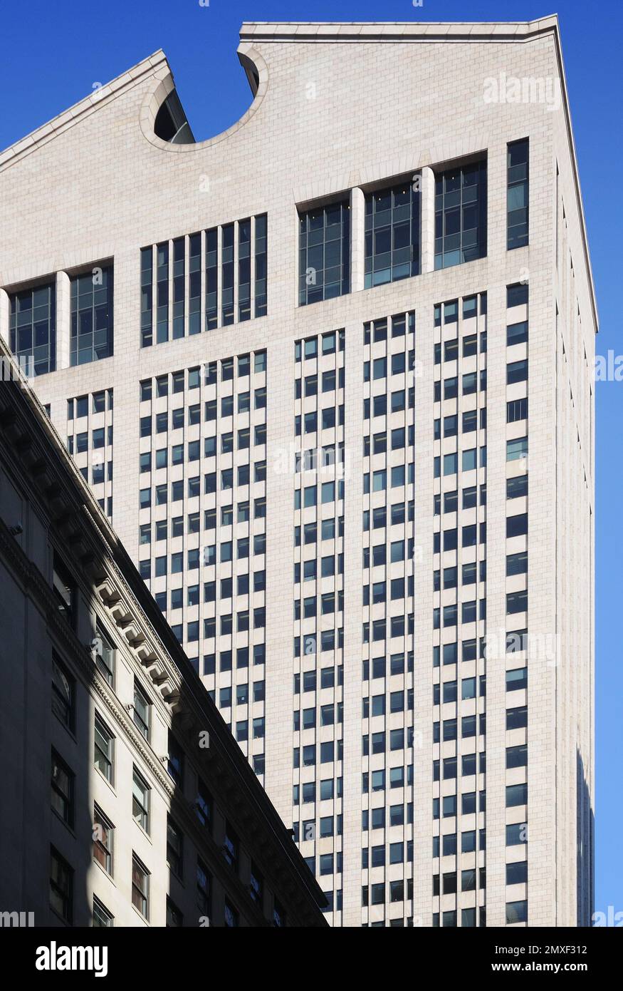 550 Madison, iconic skyscraper with a unique curved rooftop design in ...