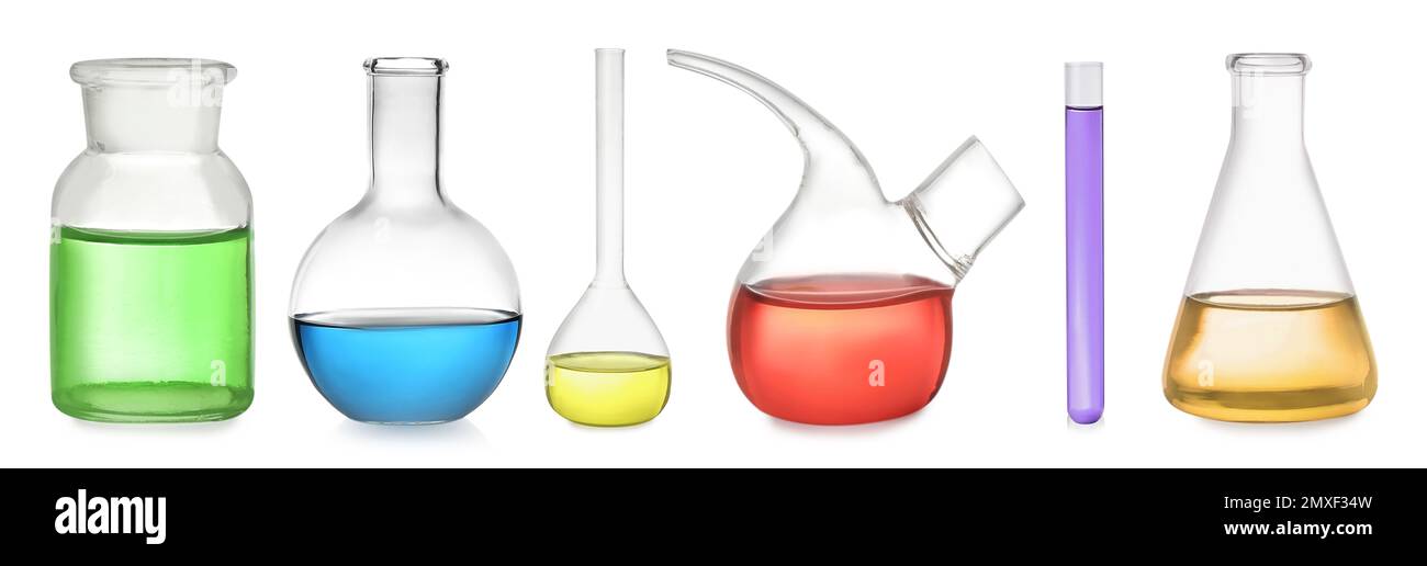 Set of laboratory glassware with colorful liquids on white background ...