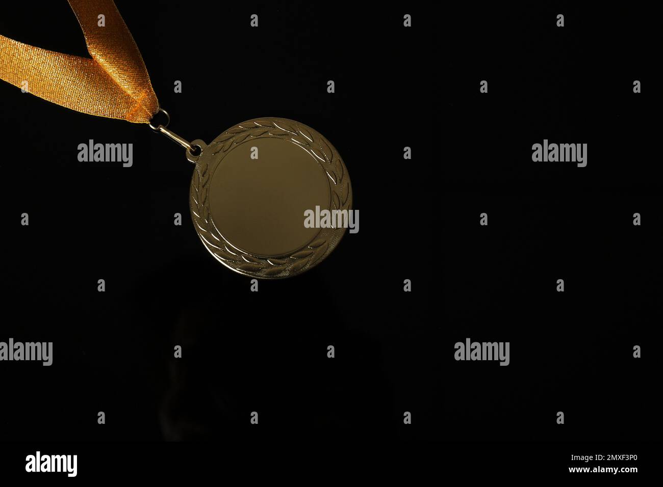 Gold medal on black background, top view. Space for design Stock Photo ...