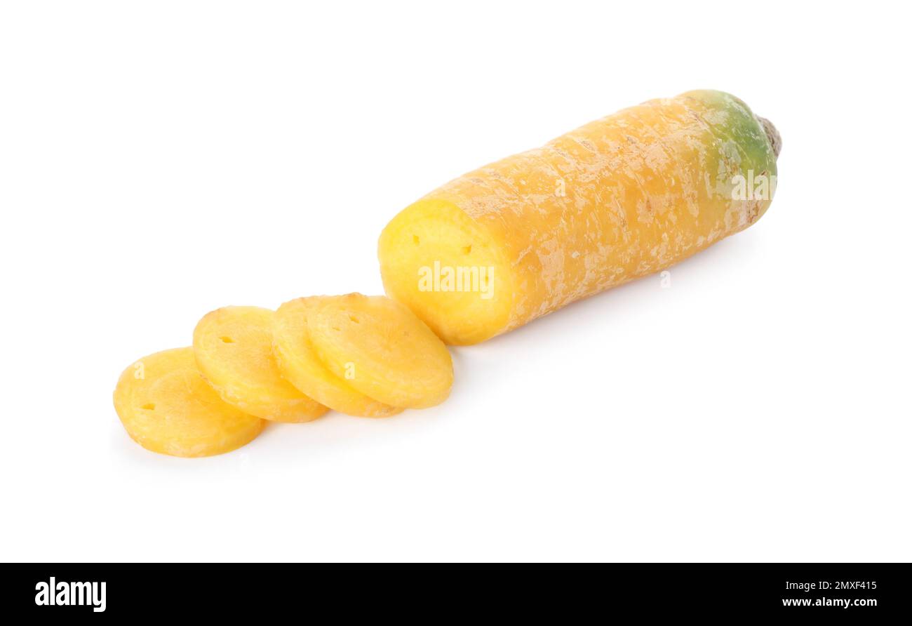 Pieces of raw yellow carrot isolated on white Stock Photo - Alamy