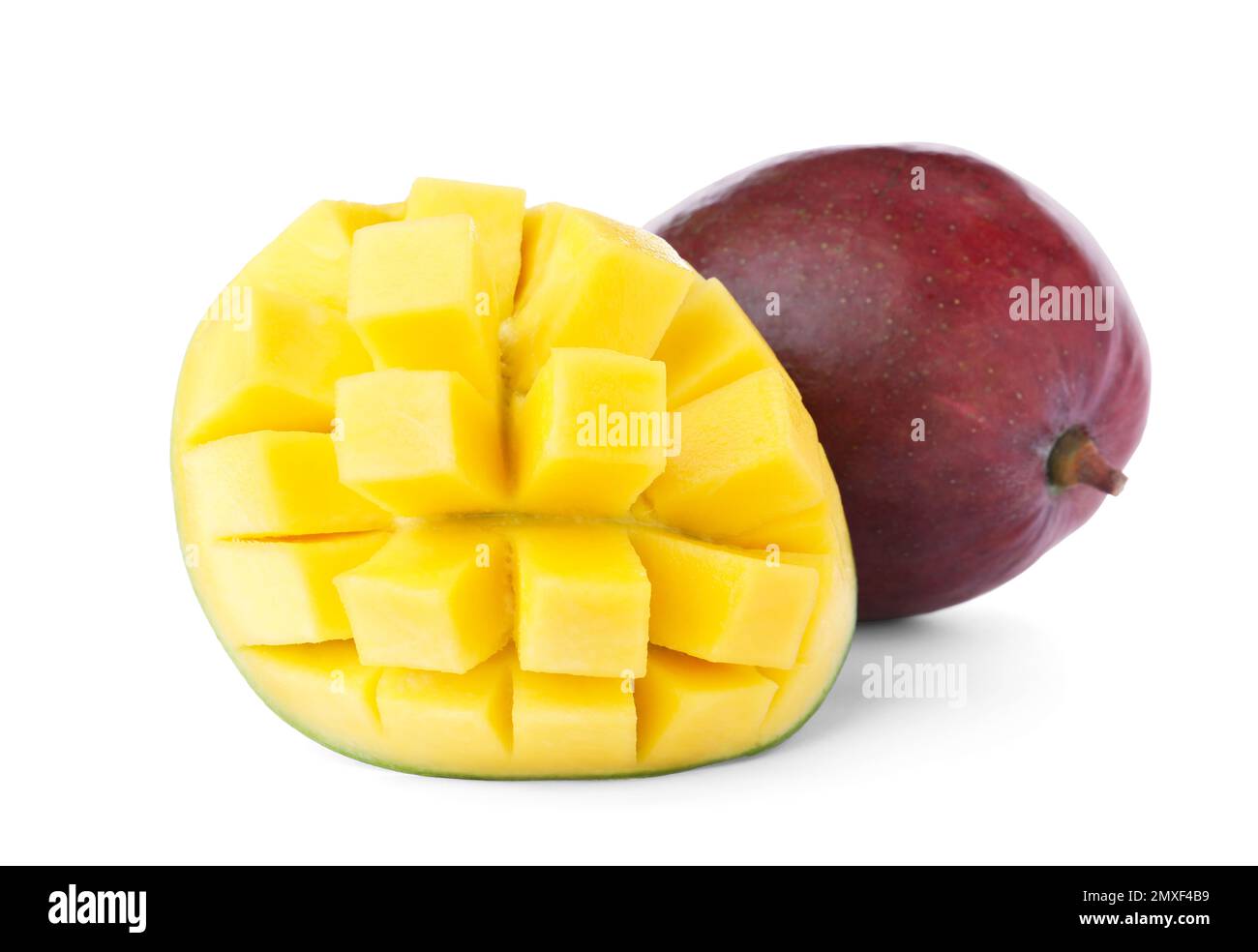 Cut and whole ripe mangoes isolated on white Stock Photo - Alamy