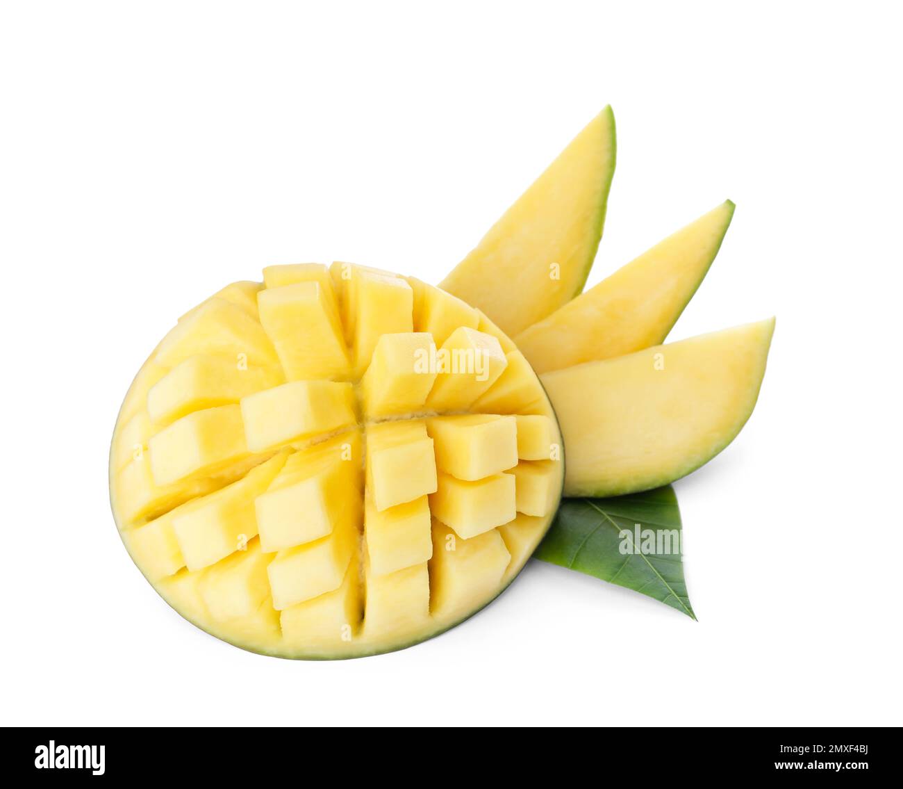 Delicious ripe mango cut into cubes and slices isolated on white Stock ...