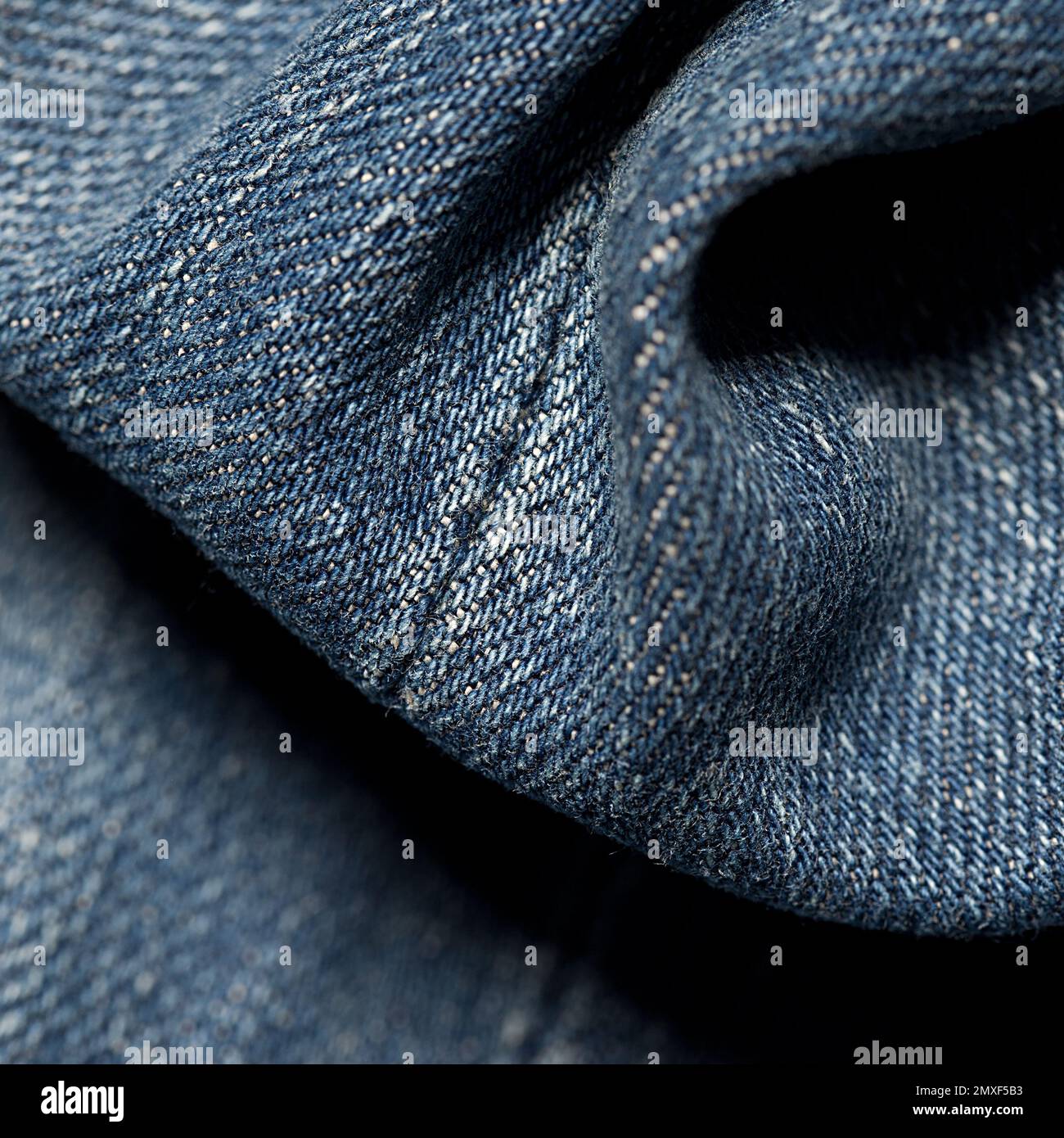 Sewn blue denim hi-res stock photography and images - Alamy