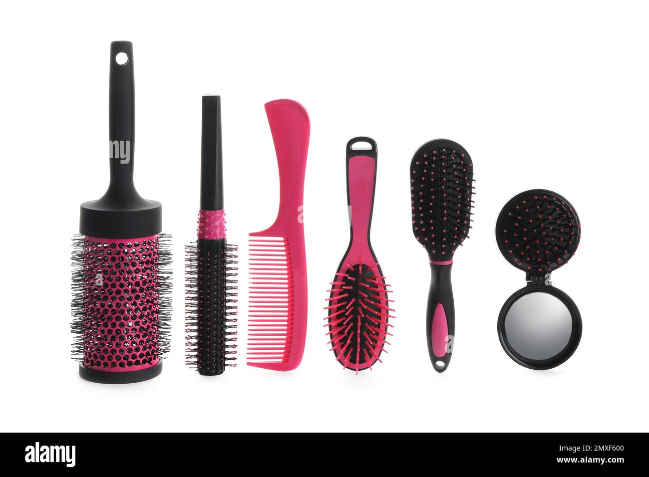 Set of professional hair brushes and comb isolated on white, top view ...