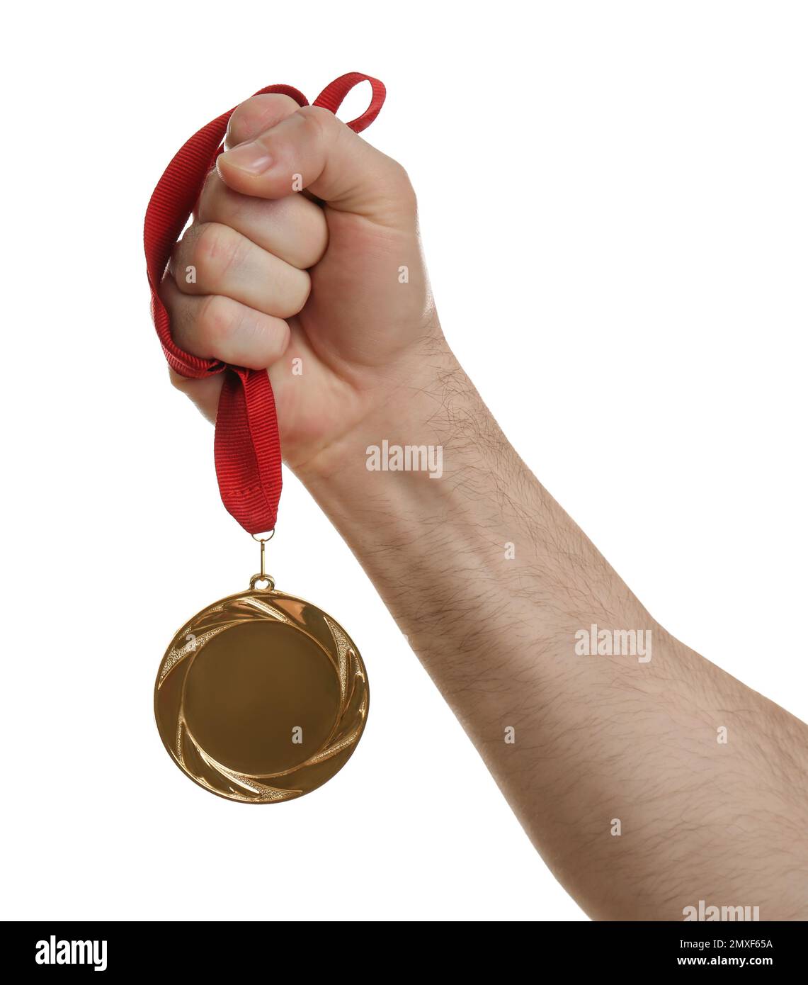 Man holding golden medal on white background, closeup. Space for design ...
