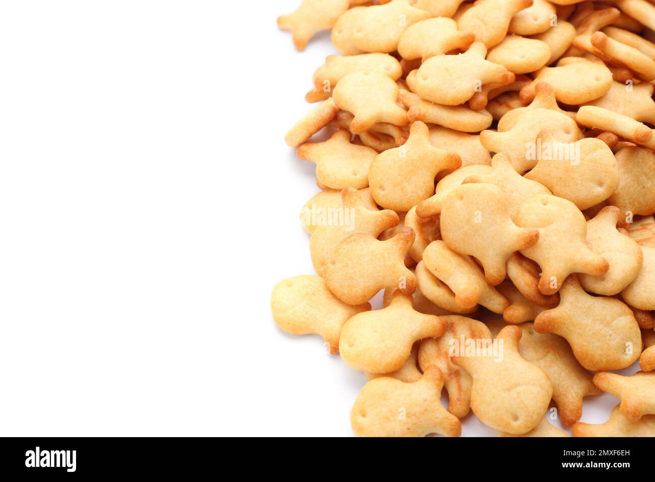 Delicious crispy goldfish crackers on white background, closeup Stock ...