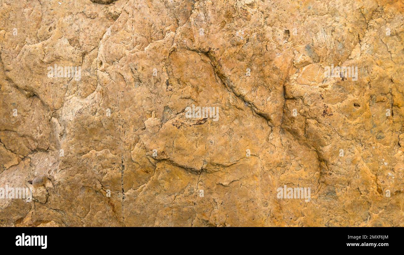 Brown rough grainy stone texture background Stock Photo - Alamy