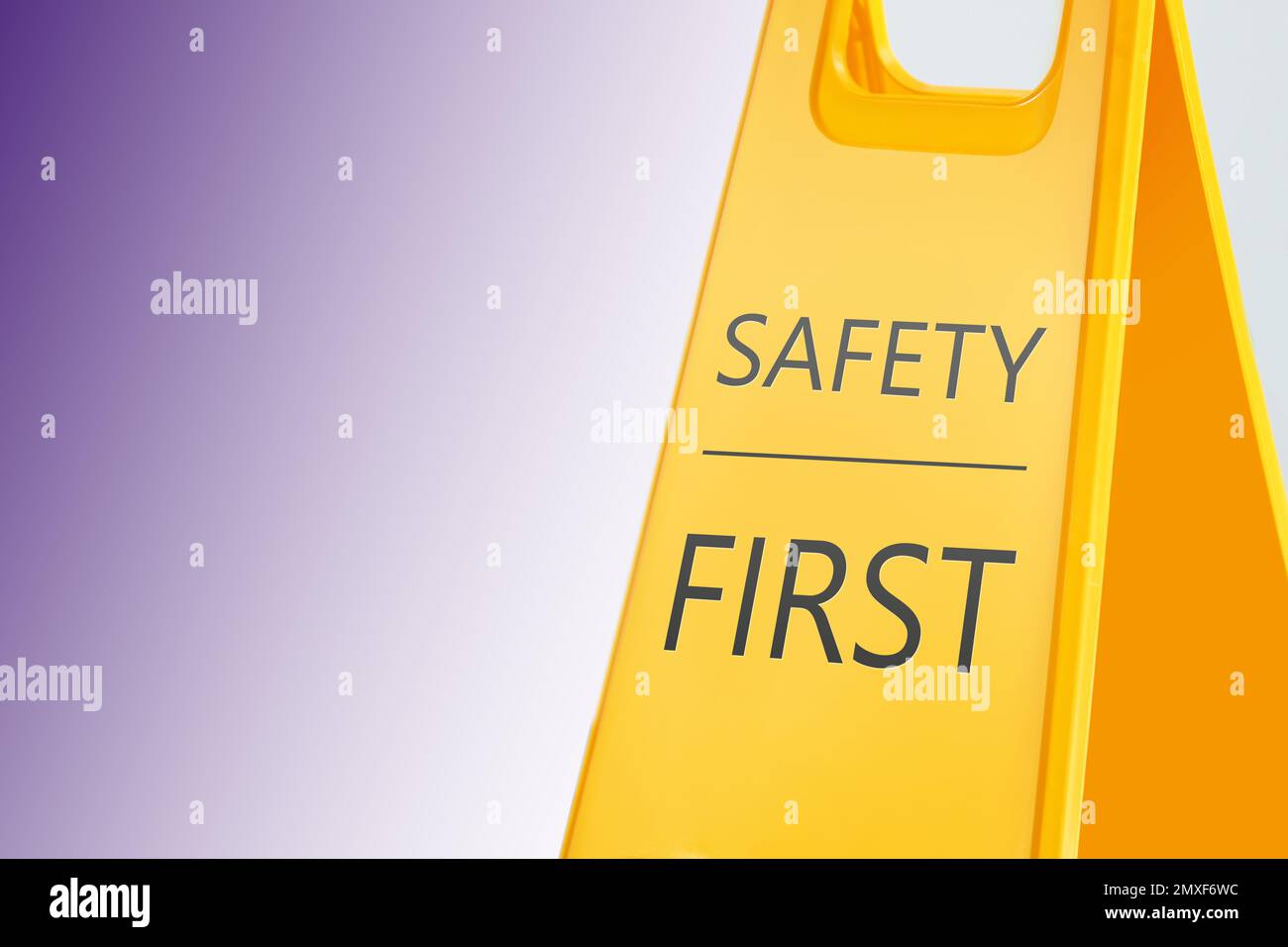 Sign with phrase SAFETY FIRST on color background, space for text Stock ...