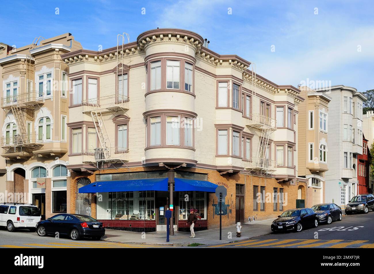 This San Francisco corner building, featuring Victorian-style bay ...
