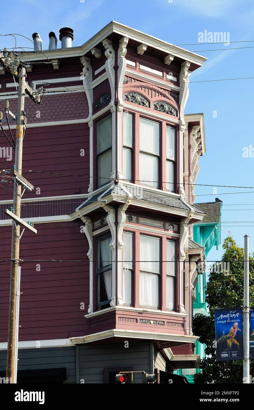 Charming Victorian house with intricate woodwork and bay window ...